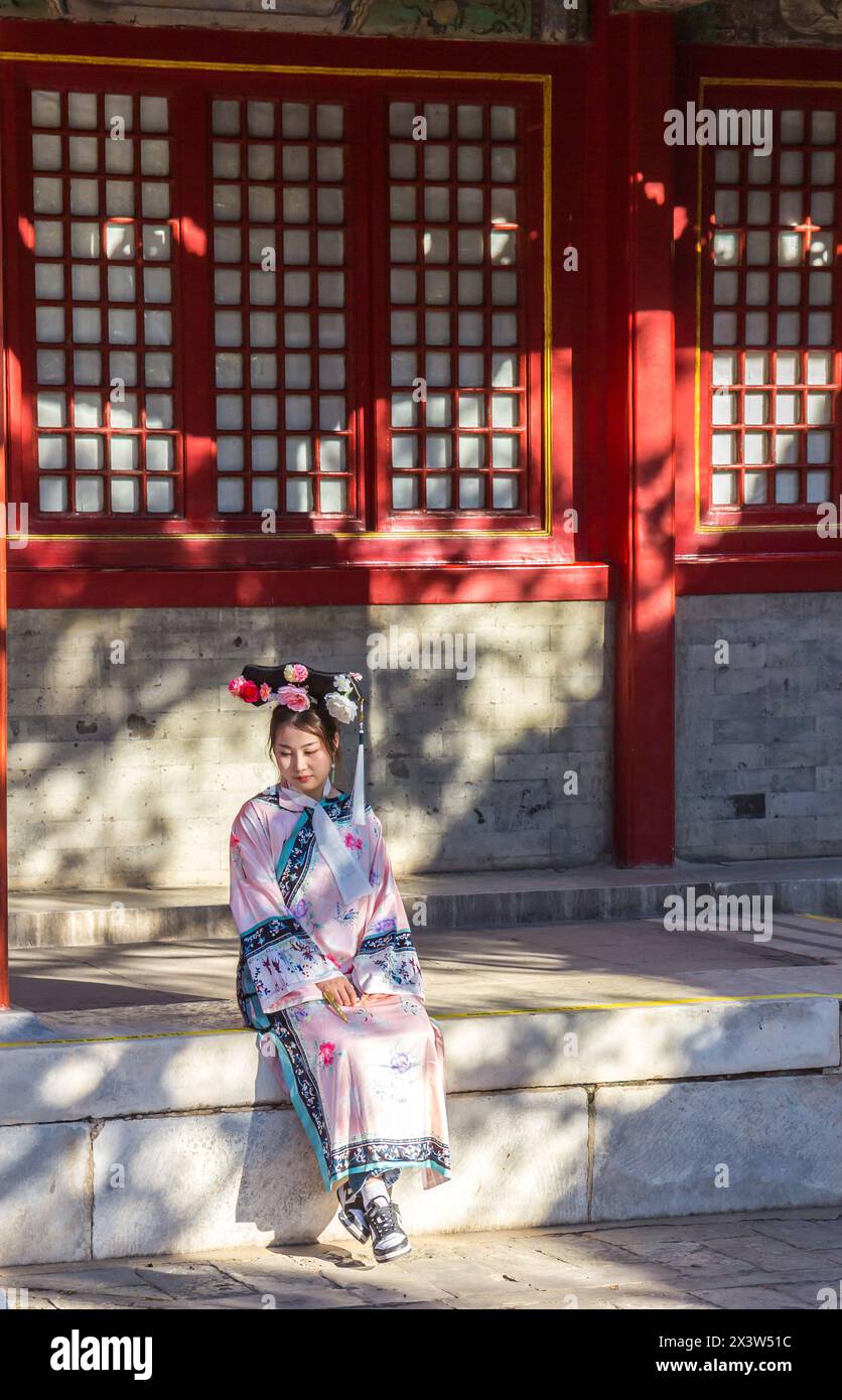 Young lady in historic costume in the Forbidden City in Beijing, China ...