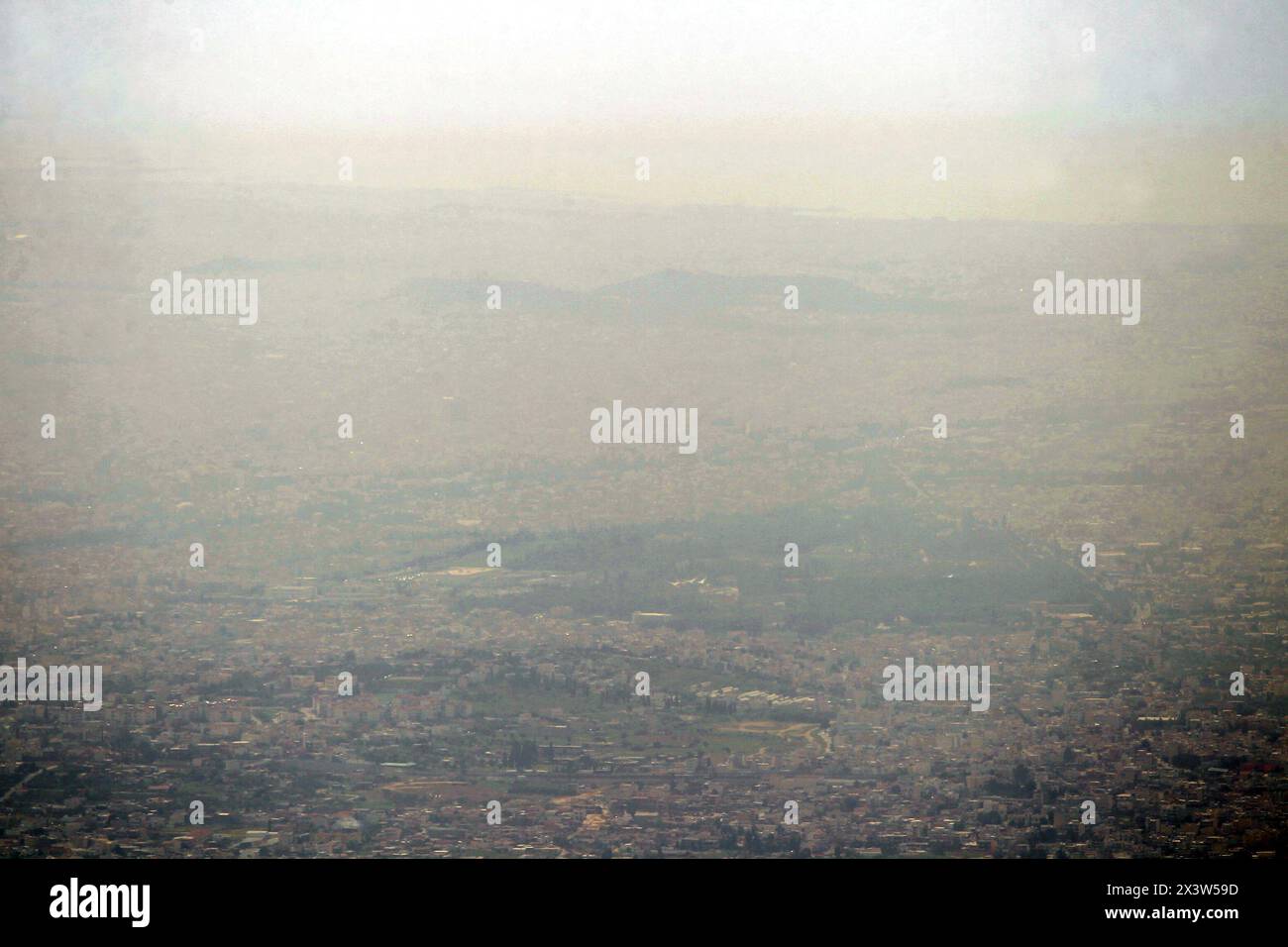 Athens covered with African dust, as seen from the burnt Mount Parnitha ...