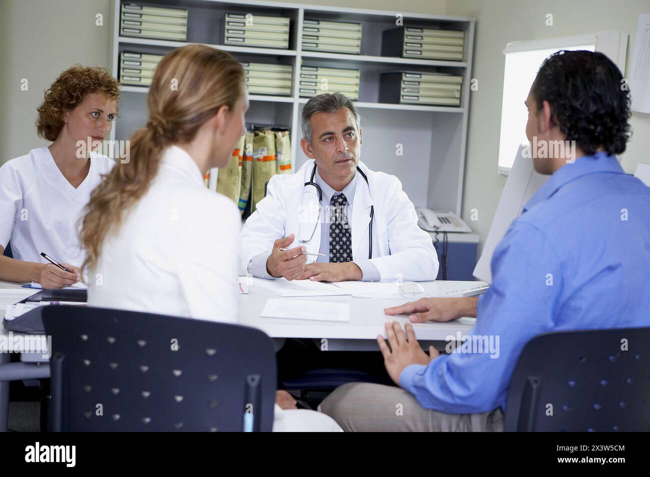 Doctor sit hi-res stock photography and images - Alamy