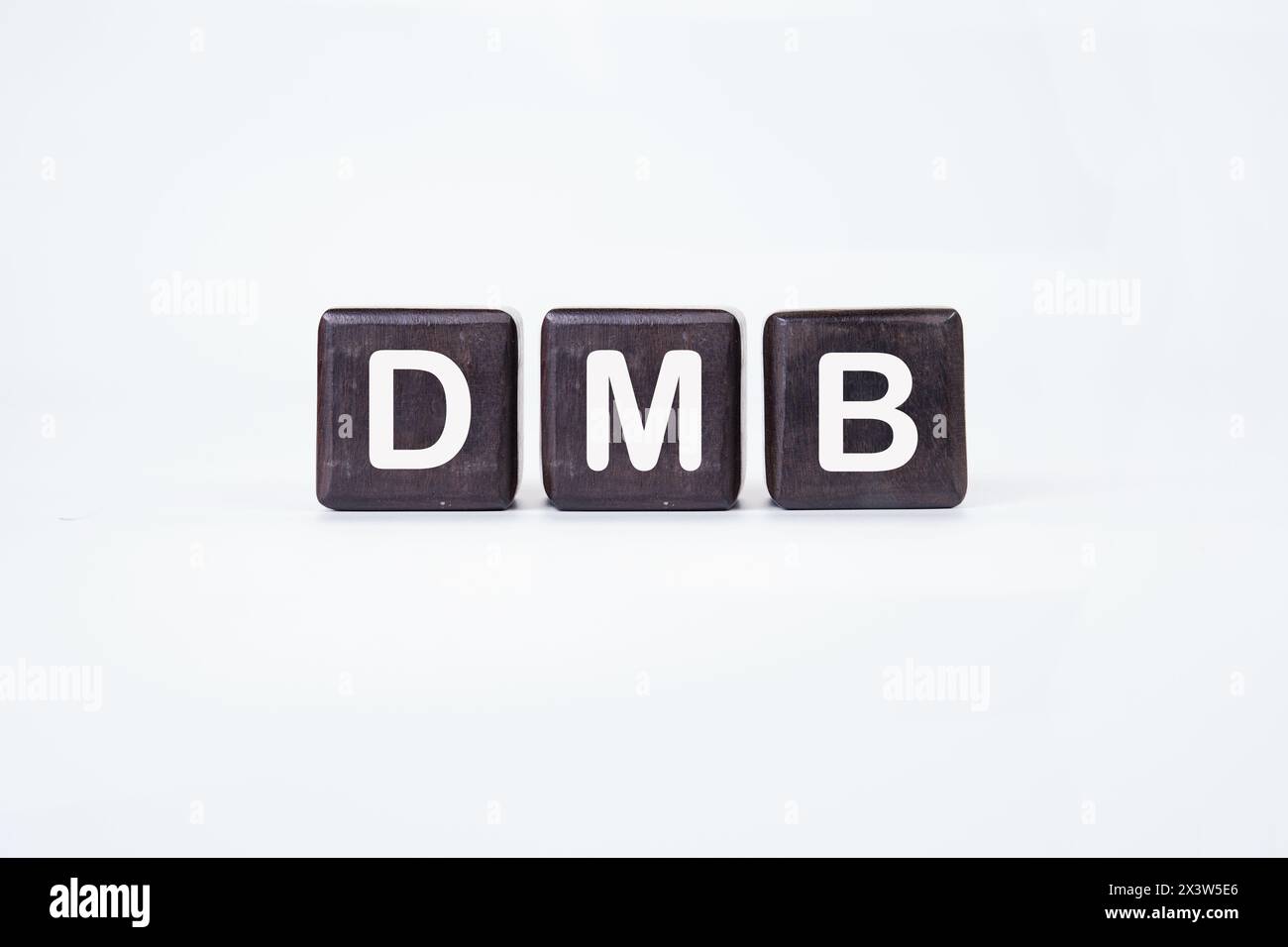 DMB text on cubes on a white background Stock Photo - Alamy