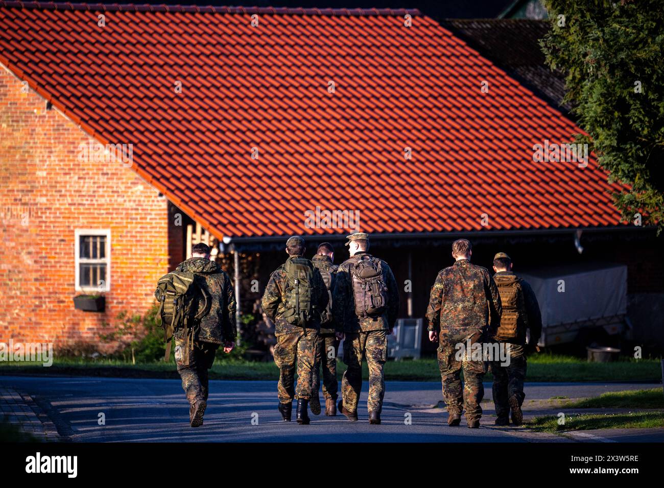 Elm, Germany. 29th Apr, 2024. Armed forces officers walk through the ...