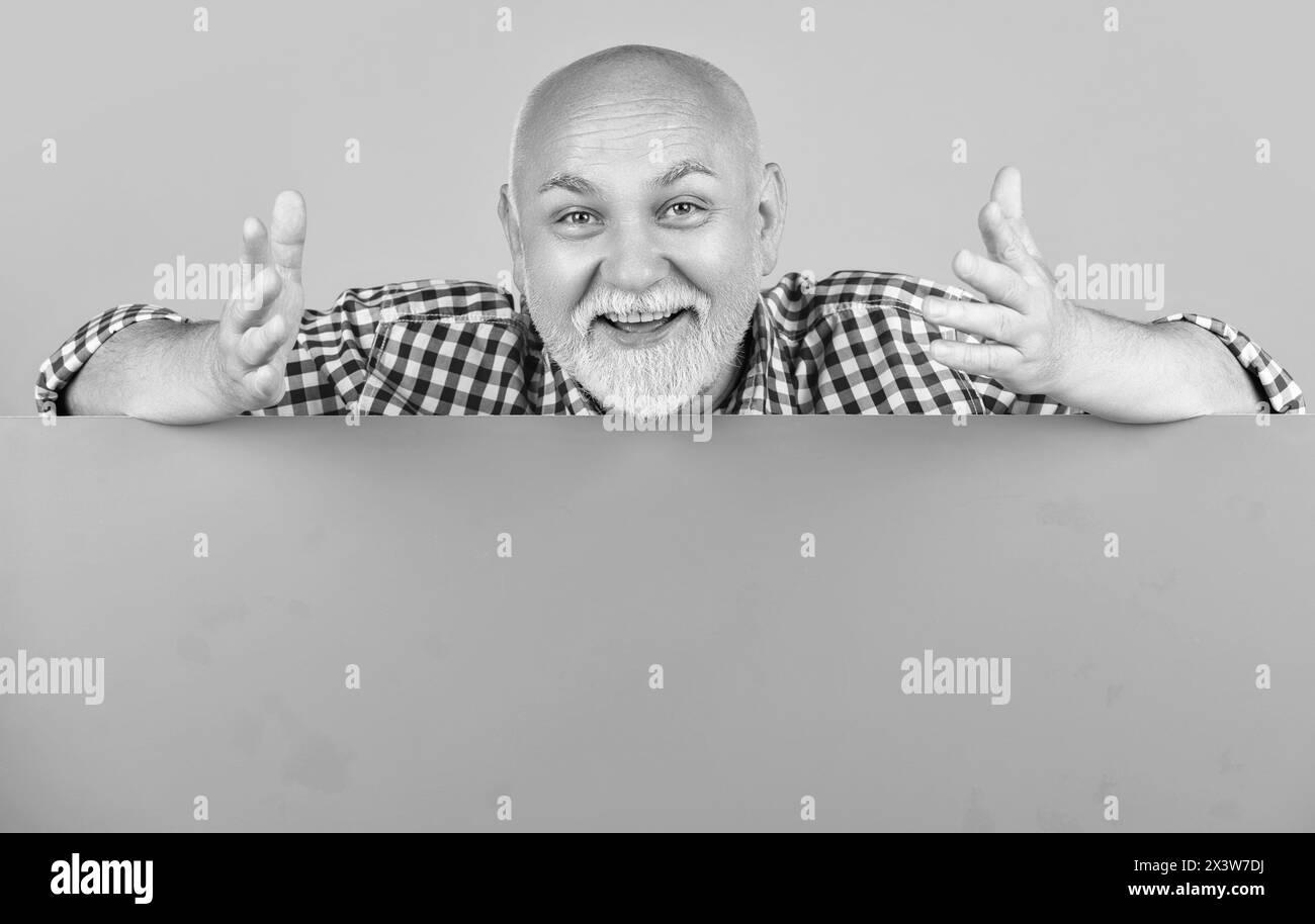 positive senior man with copy space on blank banner. advertising Stock ...