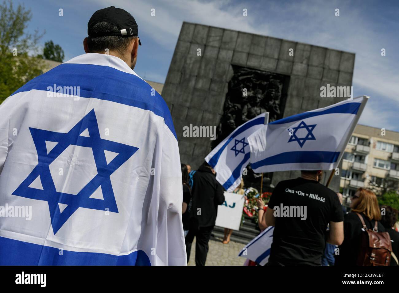A man covered with an Israeli flag participates in the annual March of ...