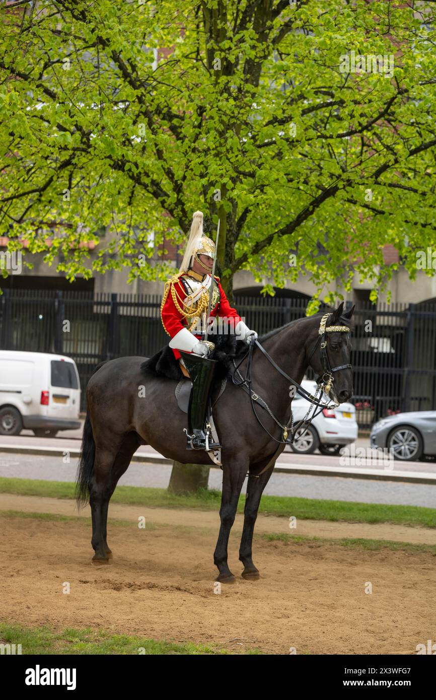 London, UK. 25th Apr, 2024. A calvary officer waits for the command ...