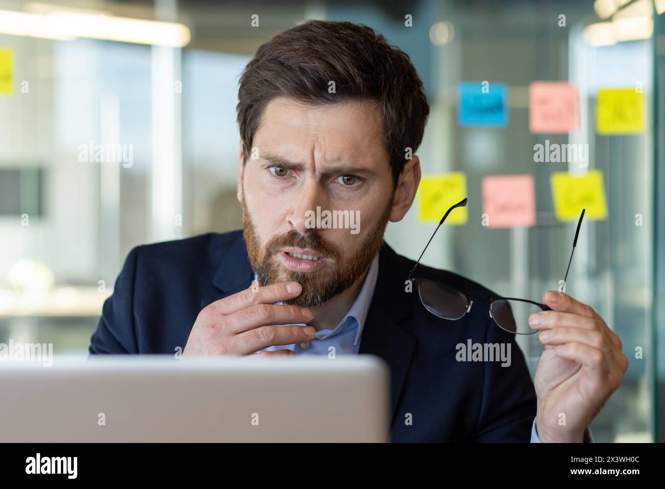 Reviewing analytics mid adult hi-res stock photography and images - Alamy