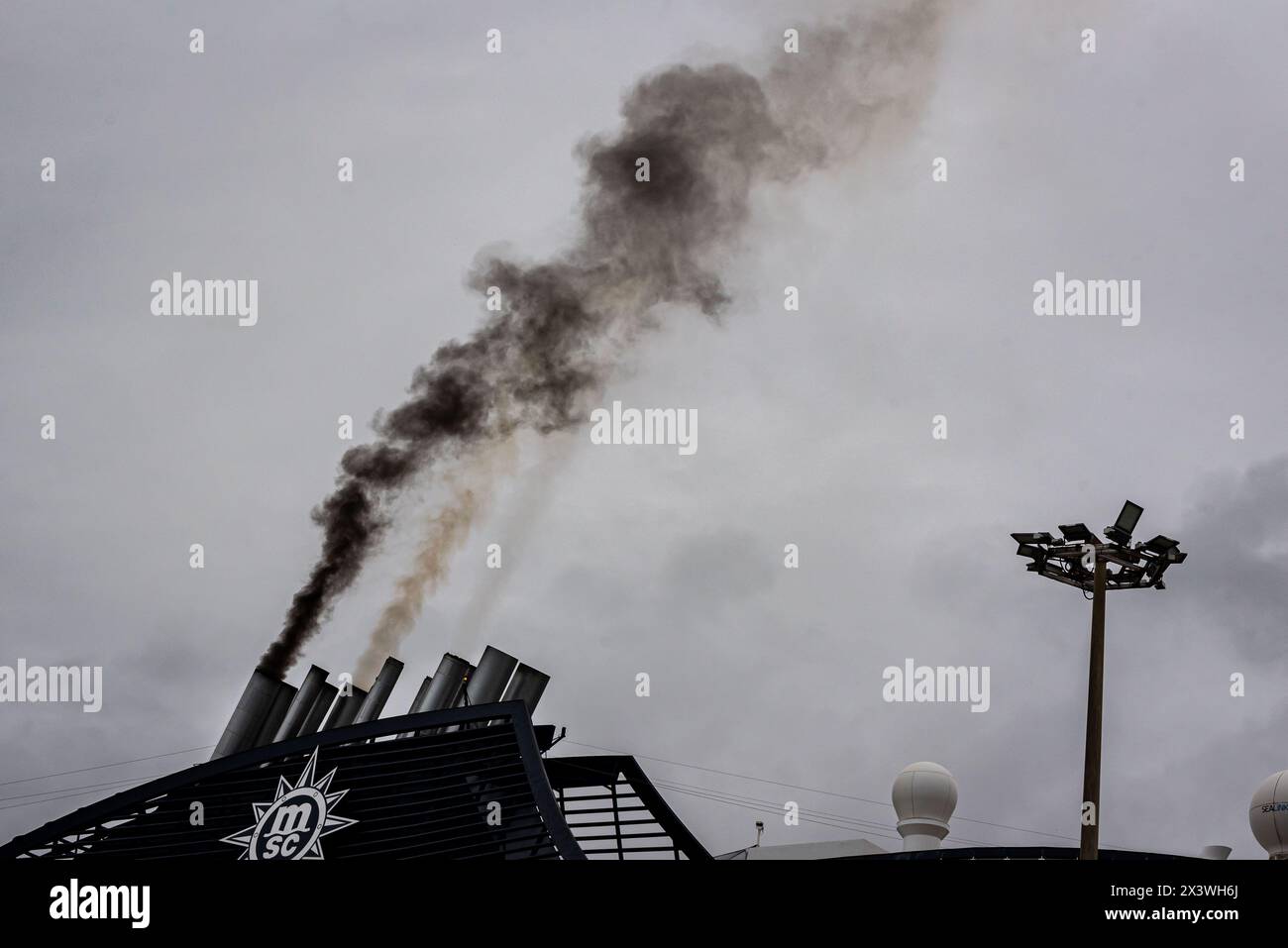 MSC Splendida cruise ship's funnel give off smoke shortly before ...