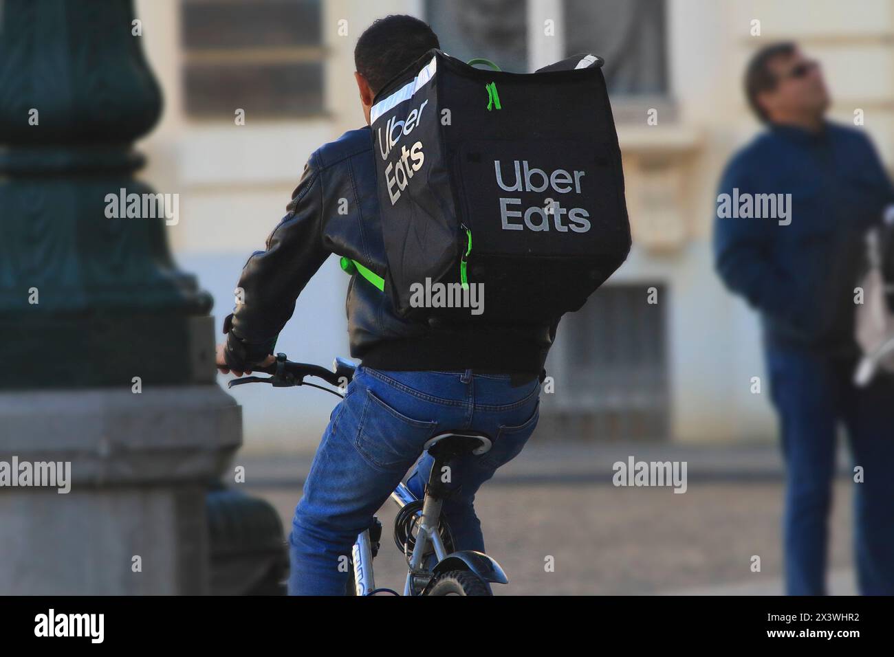 Bicycle behind car city hi-res stock photography and images - Alamy