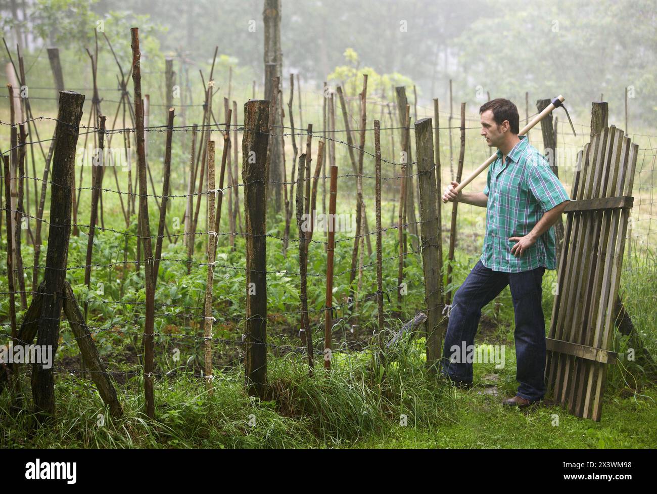 Farmer with hoe, hand tool, farming, kitchen garden, Guipuzcoa, Basque ...