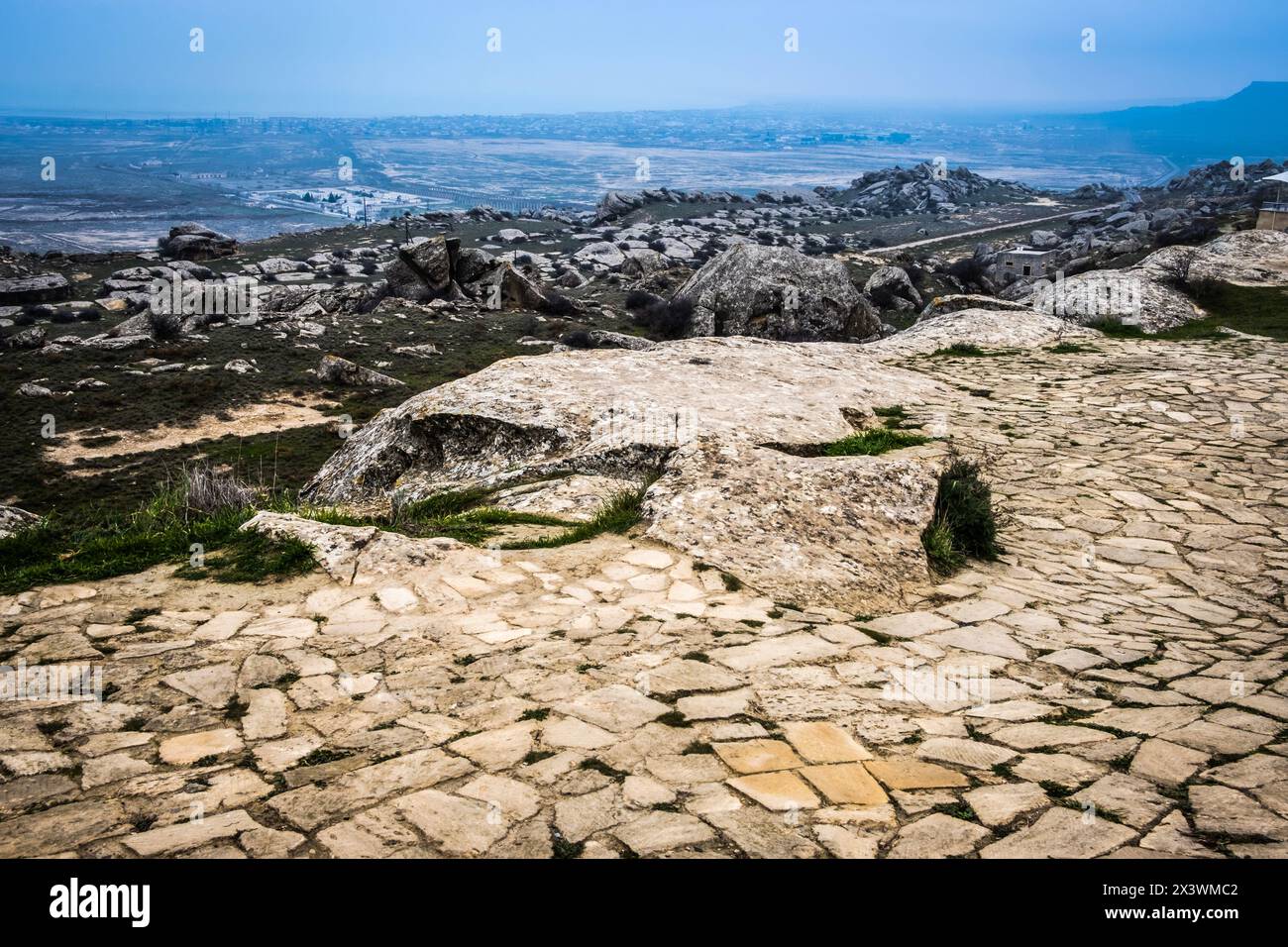 Gobustan national park ancient rocks, rock path and mountains near Baku ...