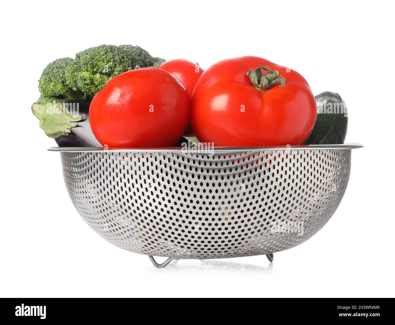 Colander with fresh vegetables isolated on white Stock Photo - Alamy