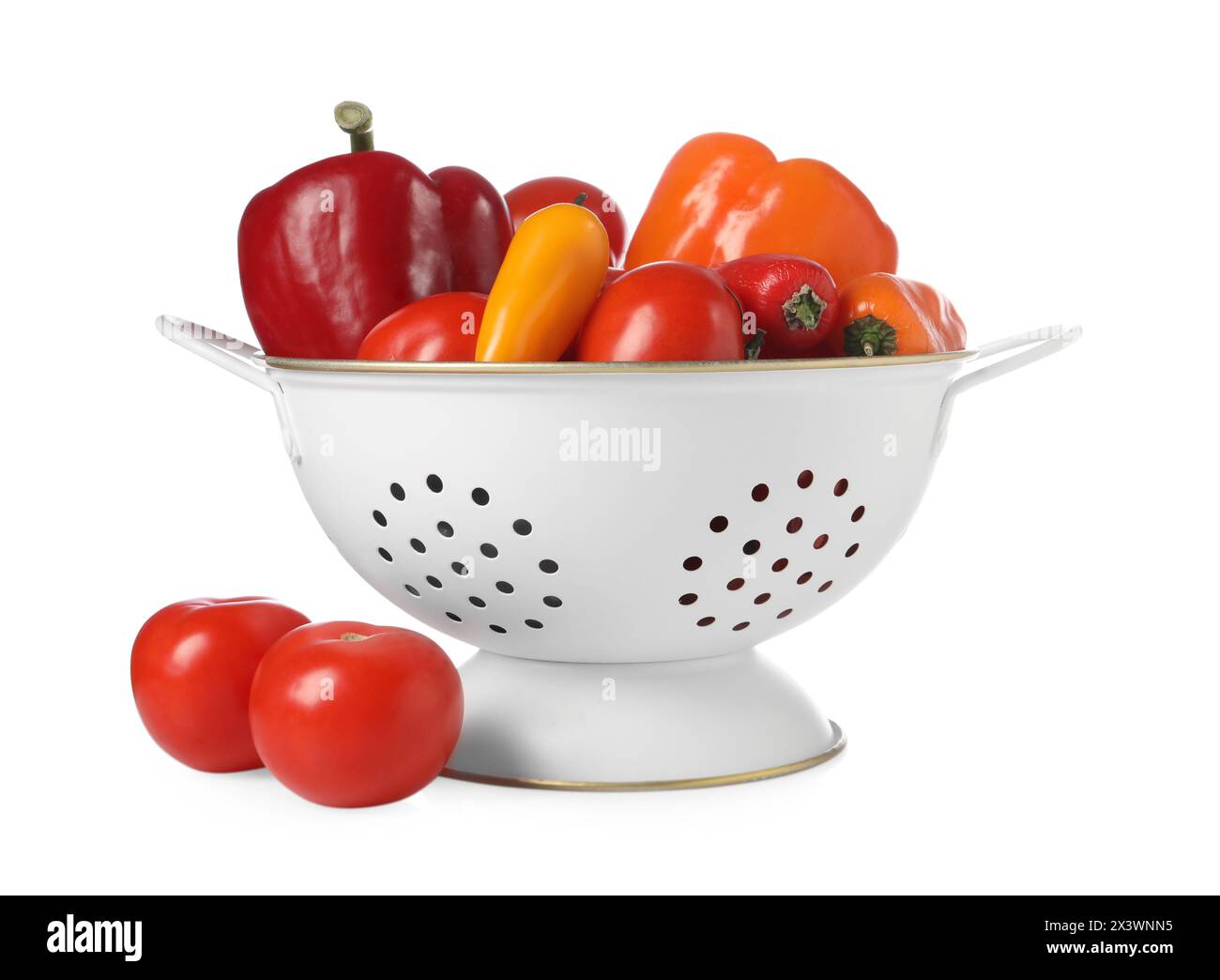 Colander with fresh vegetables isolated on white Stock Photo - Alamy