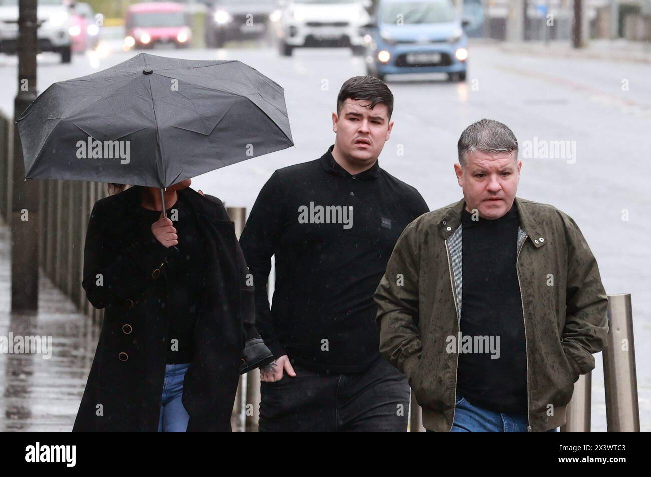 Jordan Devine (centre) outside Laganside Court in Belfast arriving for ...