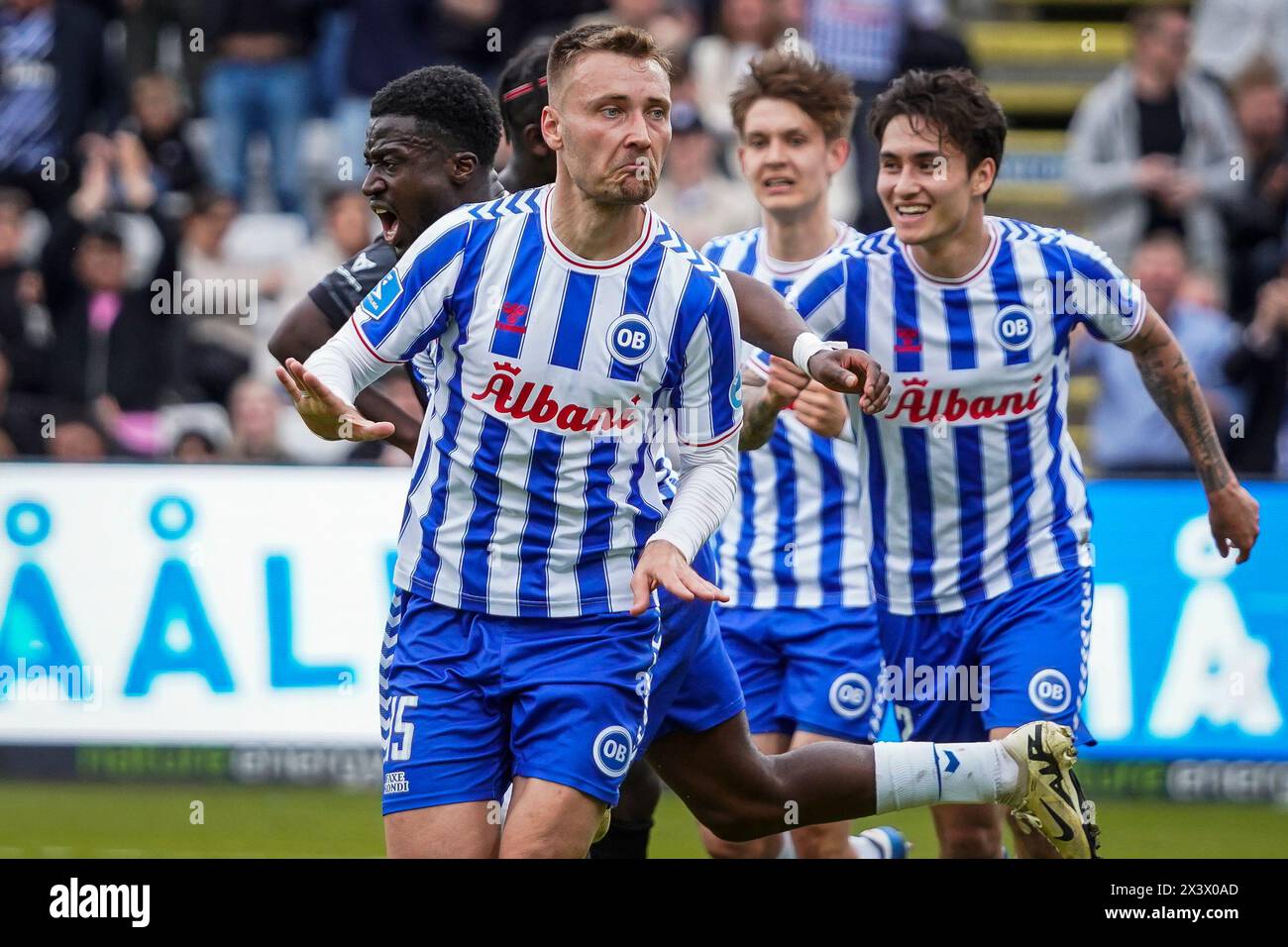 Odense, Denmark. 28th, April 2024. Tom Trybull (15) of OB scores but ...
