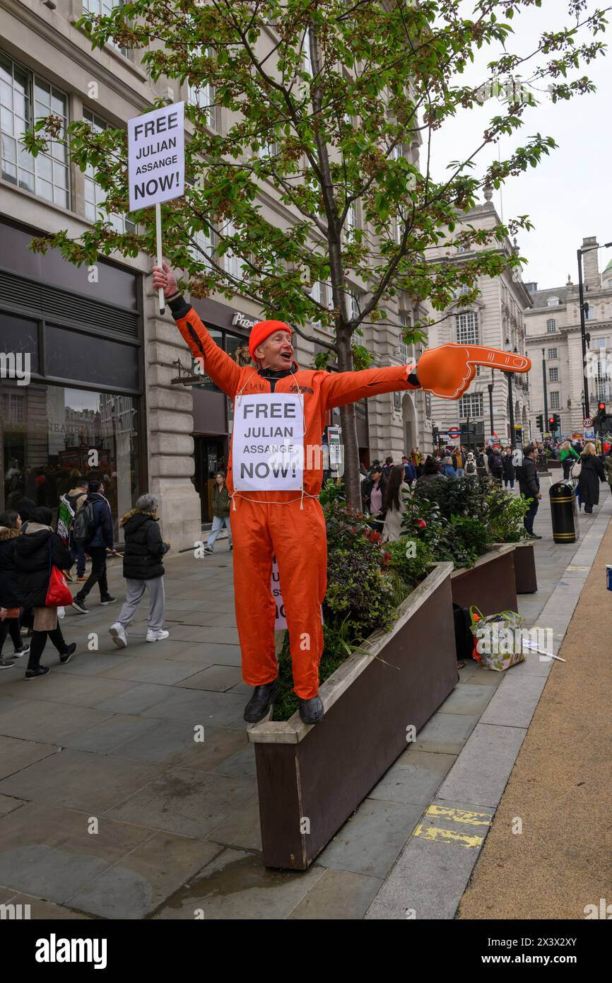 A Julian Assange supporter campaigning for his freedom, Regent Street ...