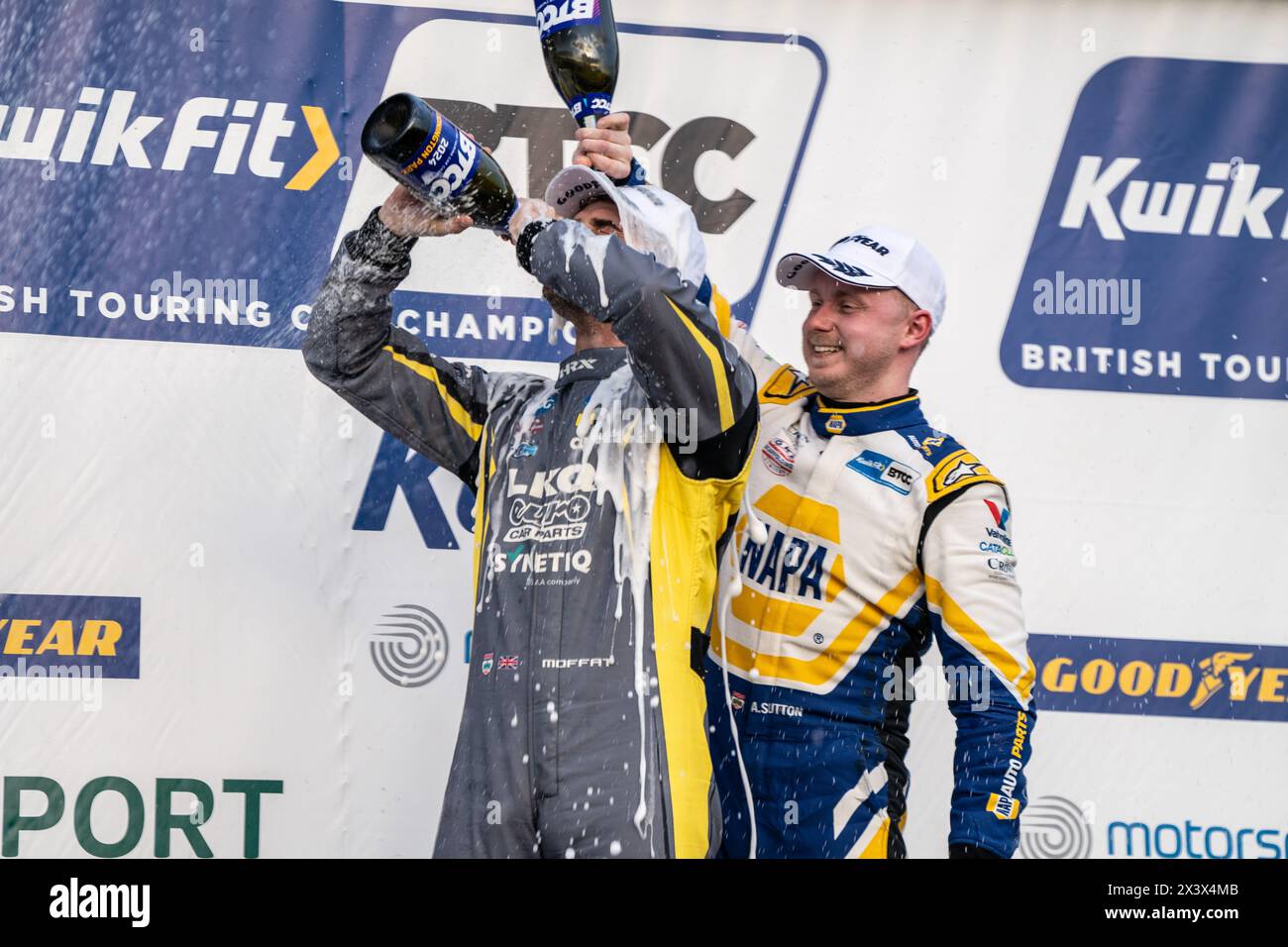 Ashu Sutton 1 Napa Racing UK pours Champagne down Aiden Moffat 16 LKQ ...