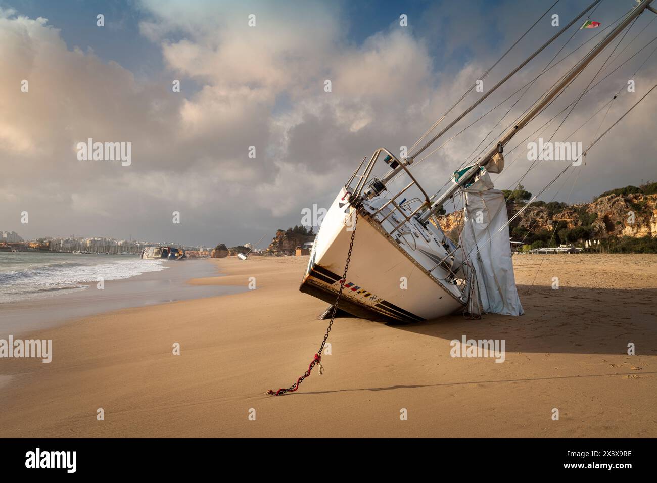 Ferragudo, Algarve, Portugal, Yachts stranded on a beach after a storm ...