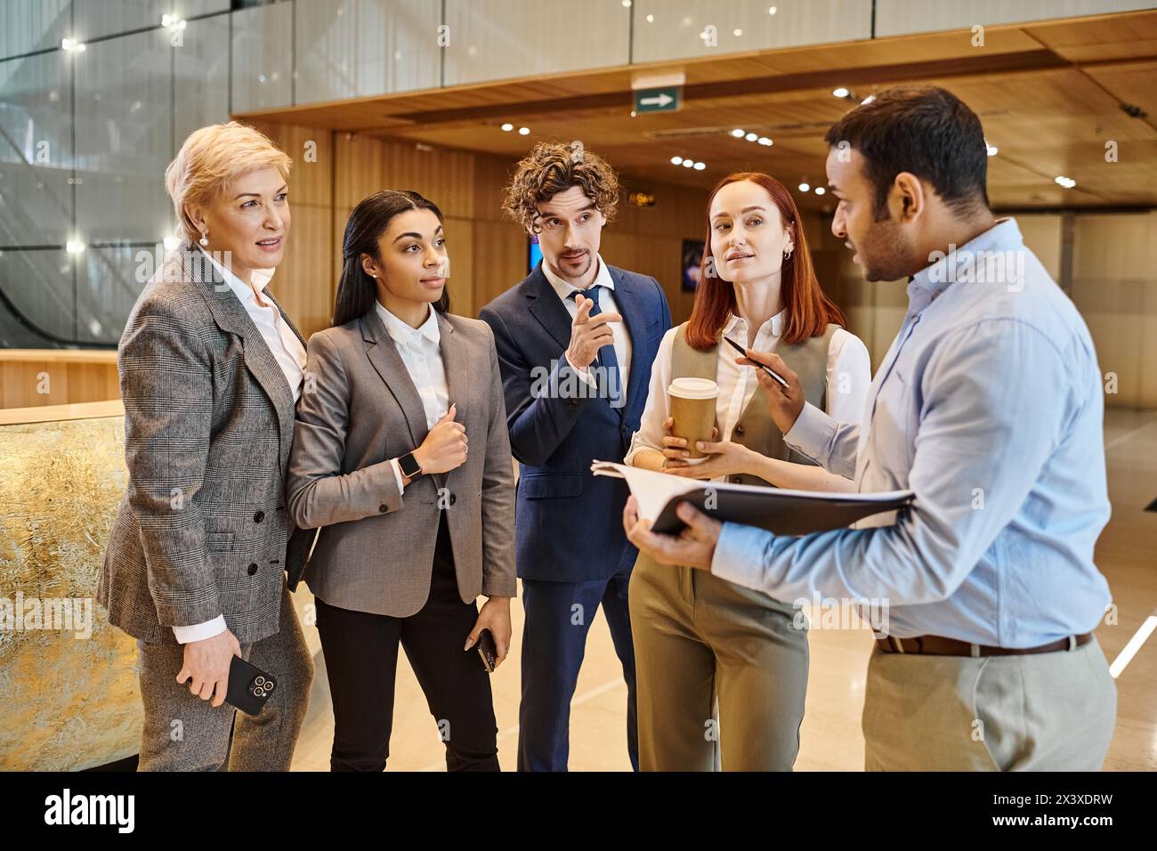 Multicultural business professionals collaborating in a circle Stock ...