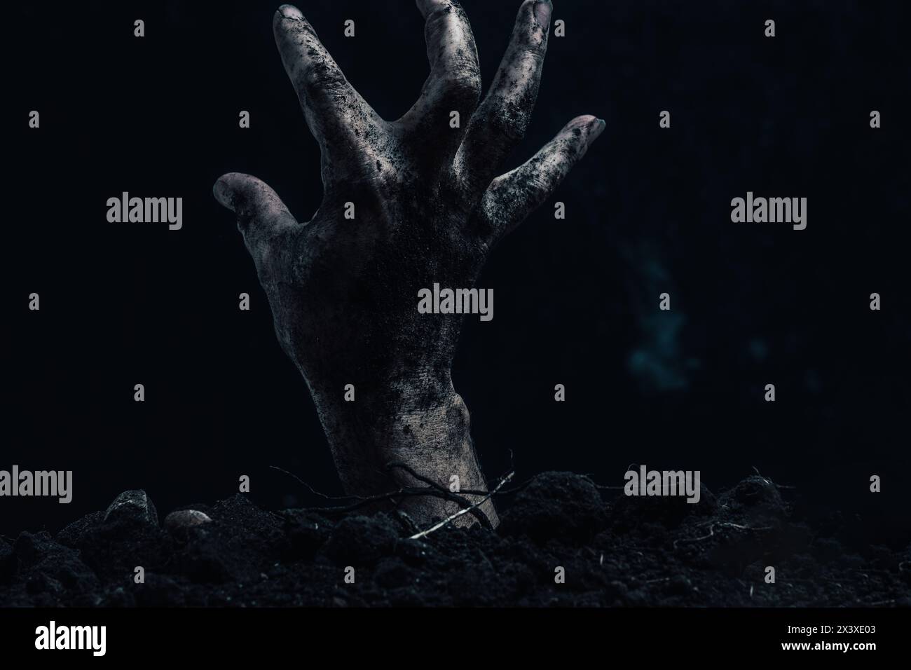 Hand coming out of ground hi-res stock photography and images - Alamy