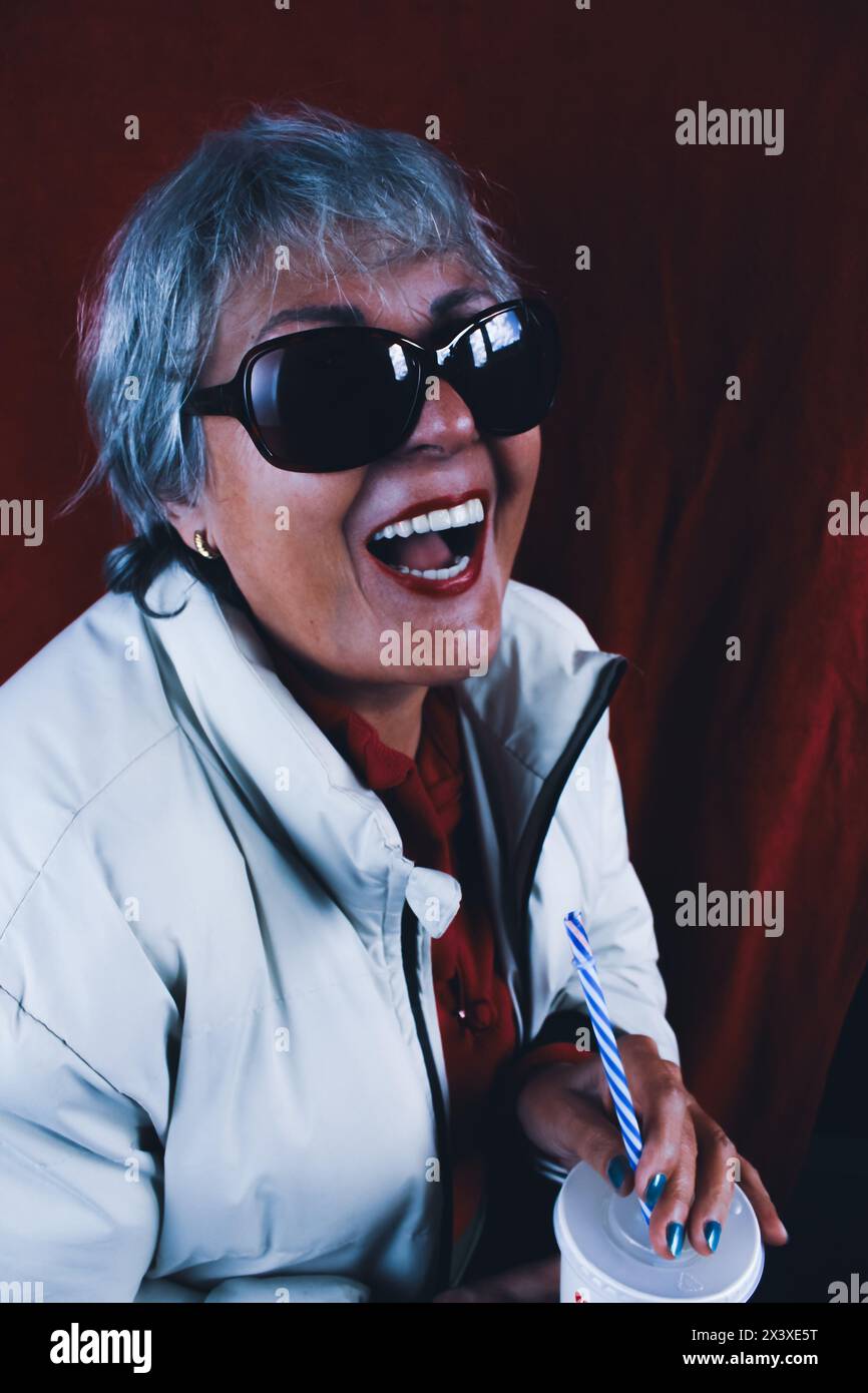 over 60s laughing woman Stock Photo - Alamy