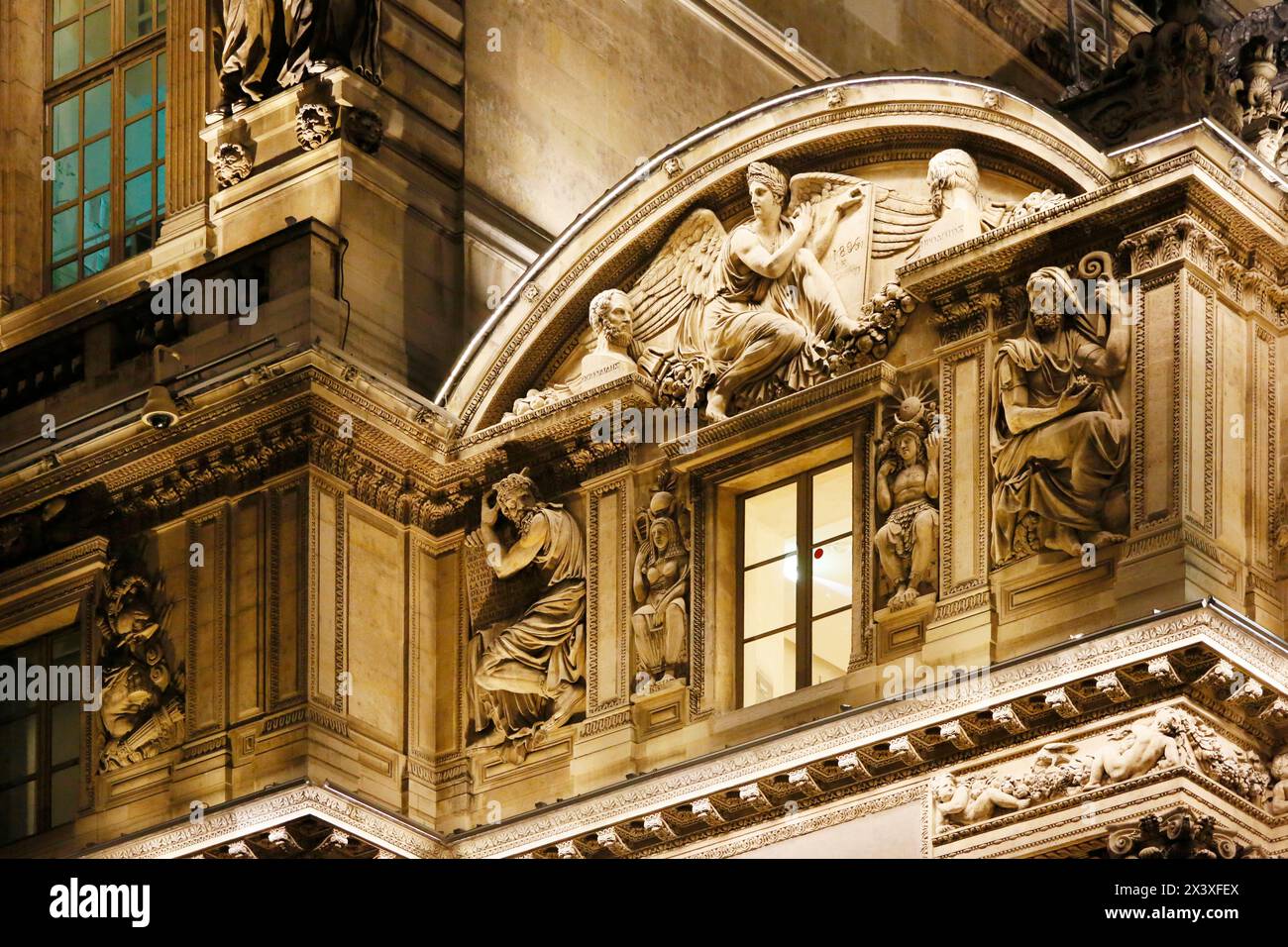 Paris. 1st district. Louvre Museum by night. Square courtyard. Facade ...