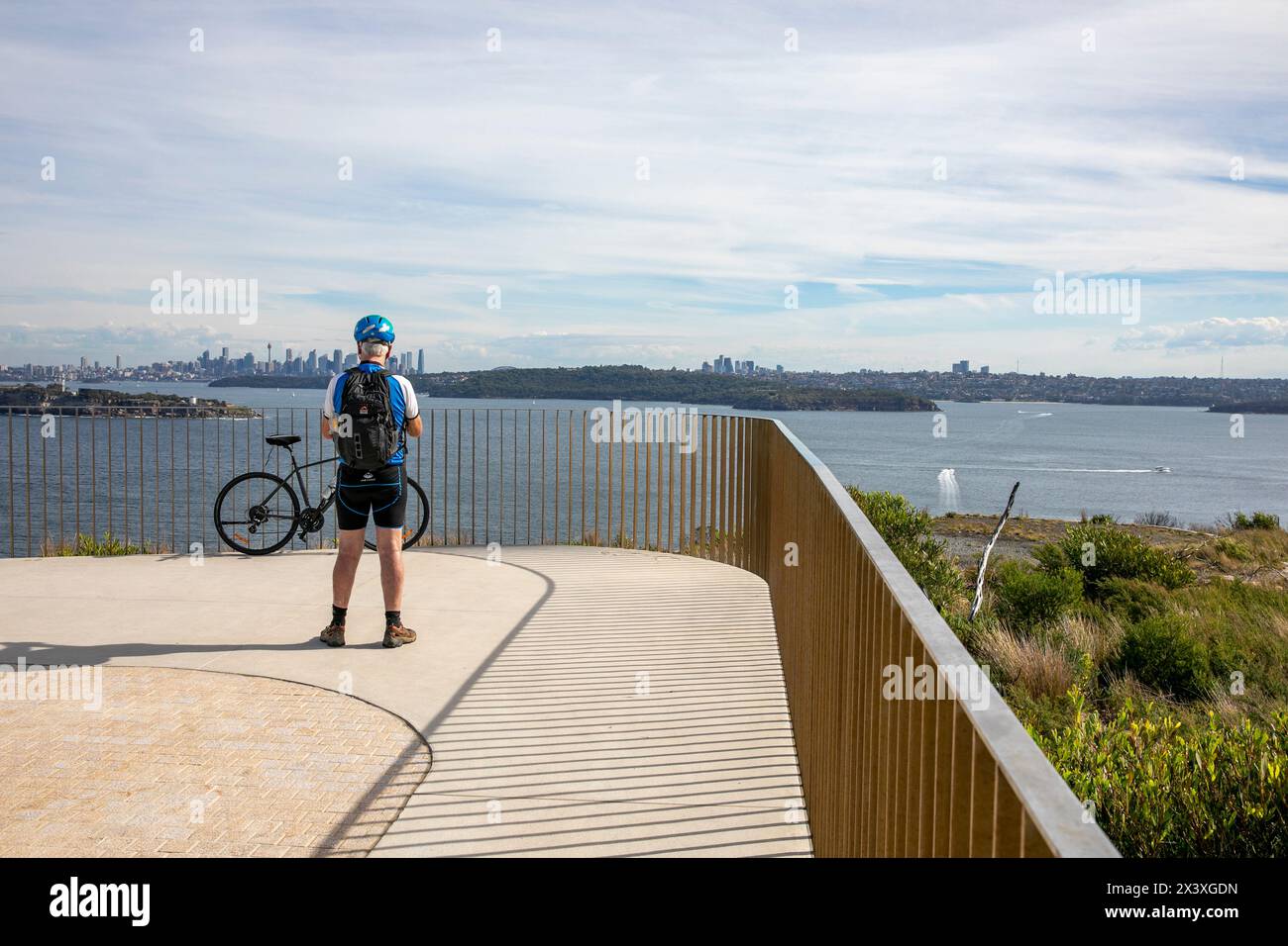 Middle aged male cyclist at Burragula lookout on Fairfax Track North ...