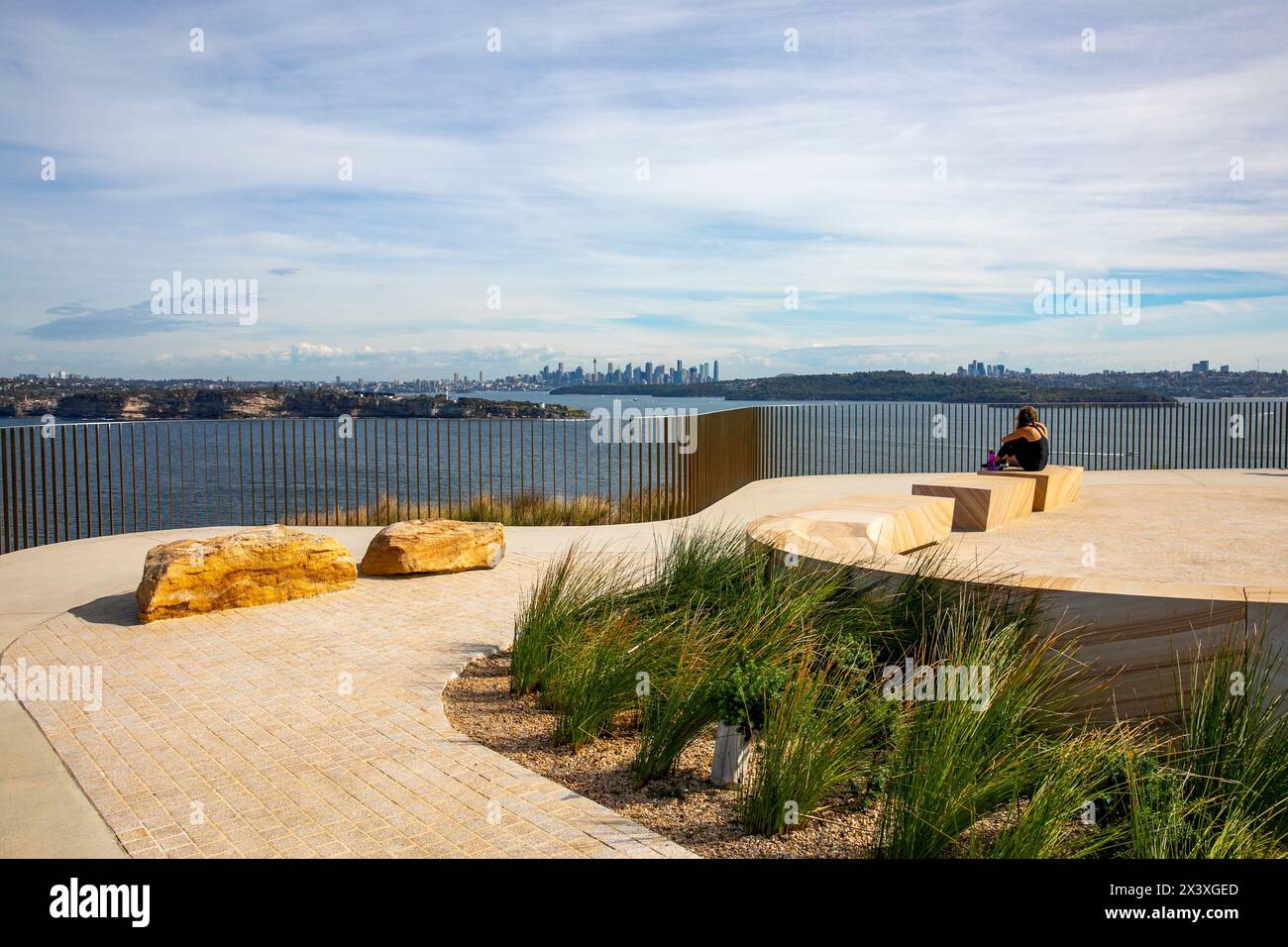 North Head Manly, woman enjoys the view of Sydney harbour and Sydney ...
