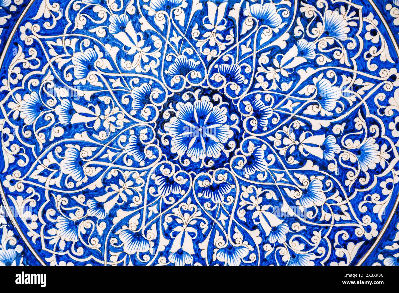 blue pattern on traditional oriental Uzbek ceramic plates hand-painted ...