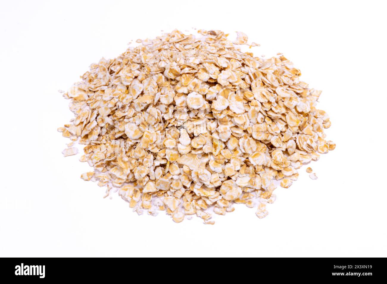 A pile of Oatmeal flakes isolated on white background Stock Photo - Alamy