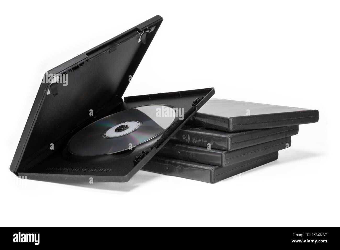DVD cases and a disc on white background Stock Photo - Alamy