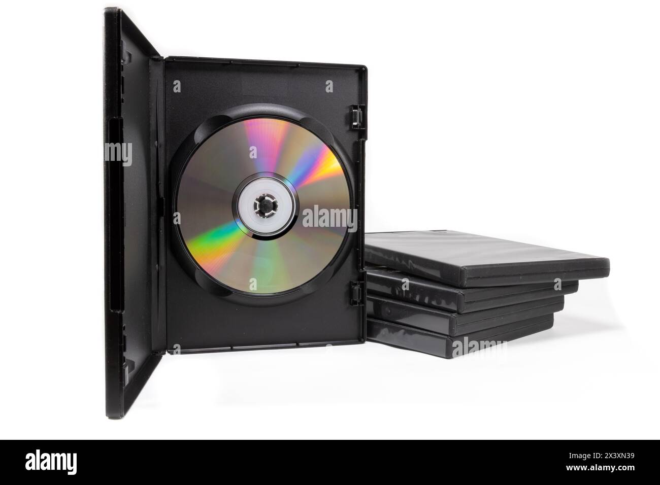 DVD cases and a disc on white background Stock Photo - Alamy