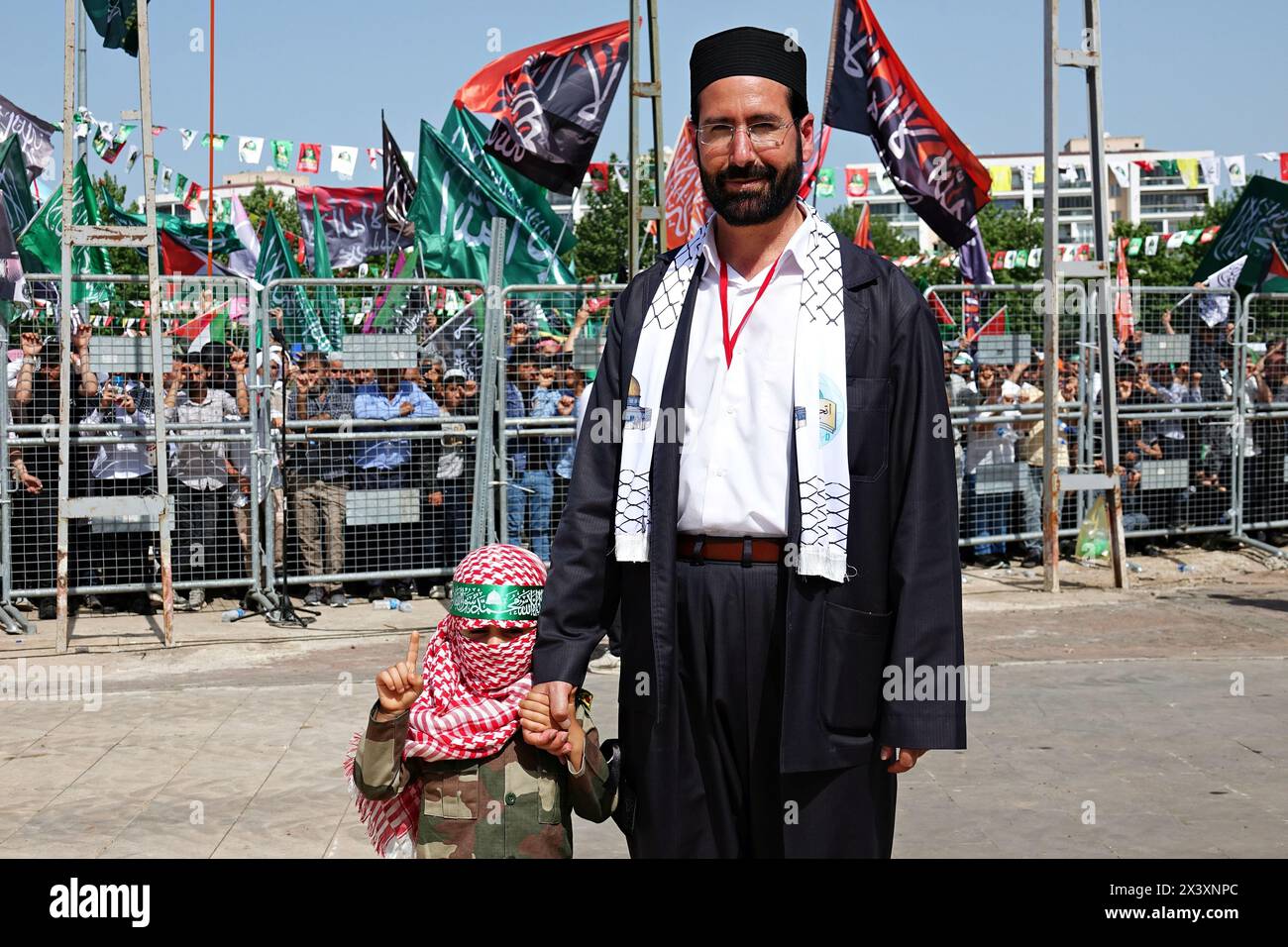 A father dressed his child as a Hamas militant seen at the event in ...