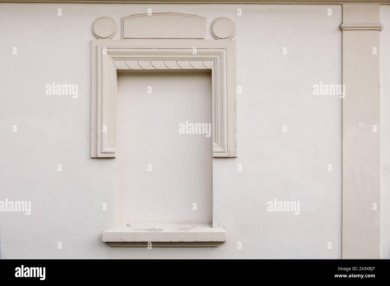 Elegant niche with classic pillars. Bricked up window. Architectural ...