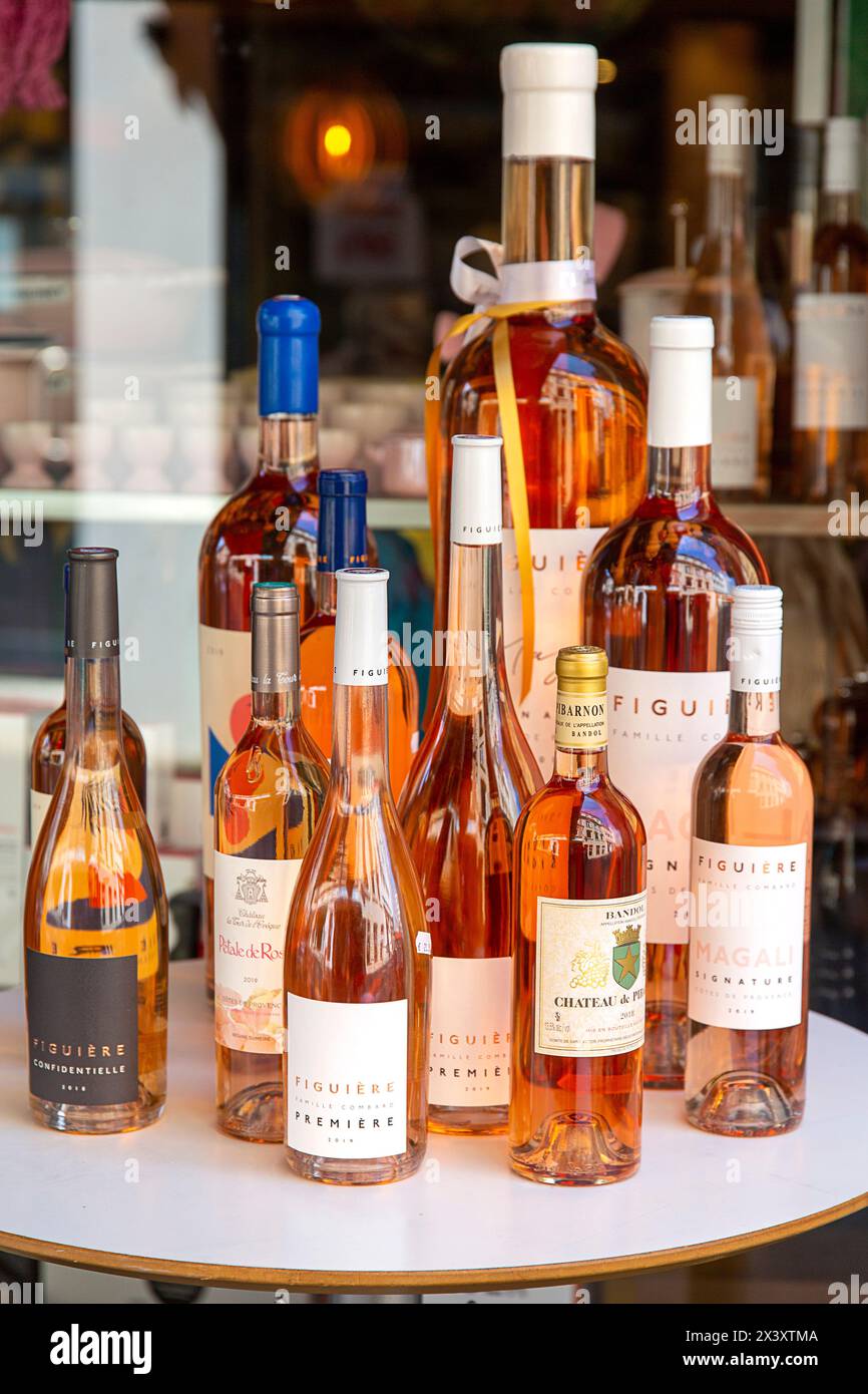 Collection of rose wines in a shop window Stock Photo - Alamy