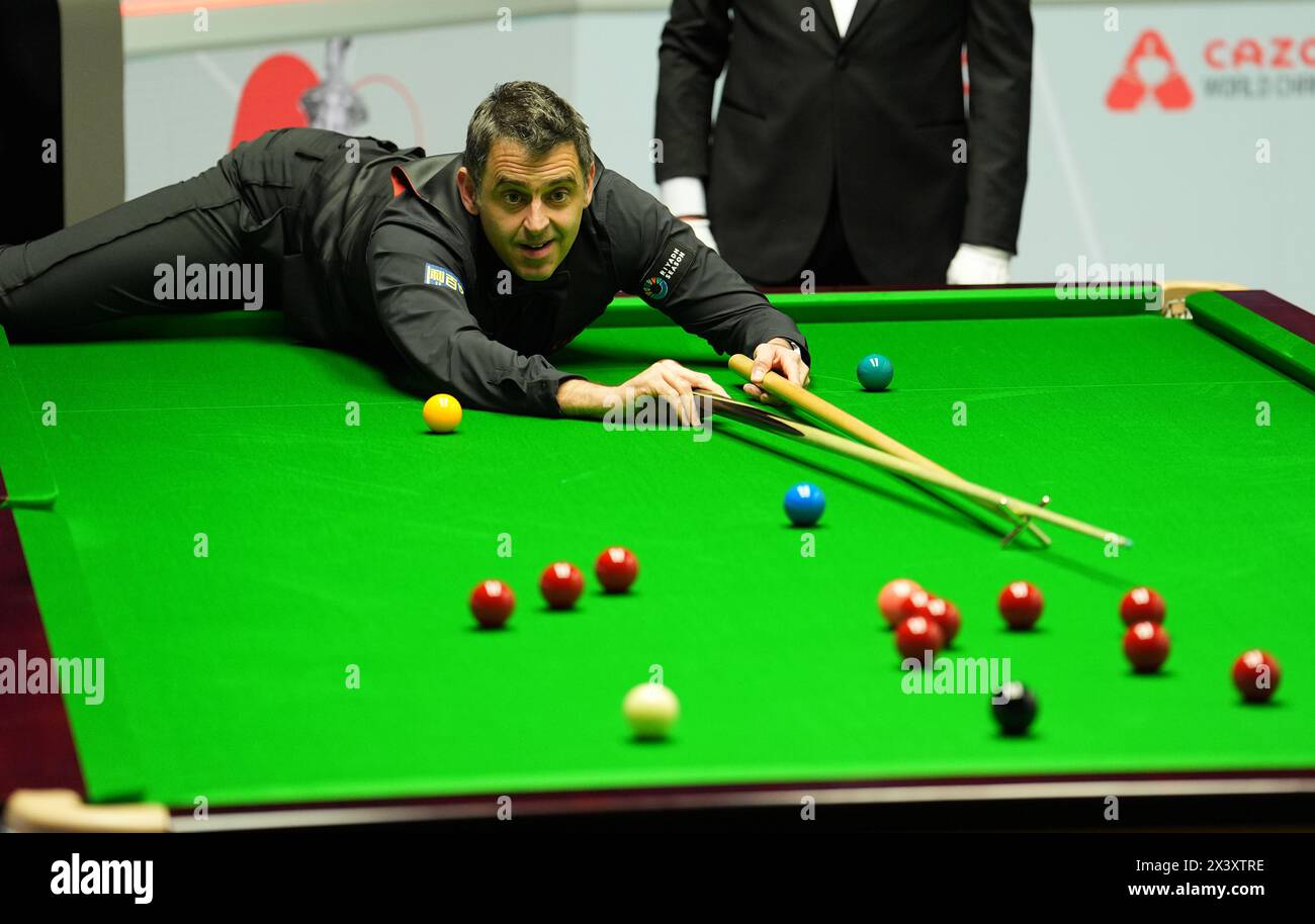 Ronnie O'Sullivan reacts after a missed shot during the match against ...