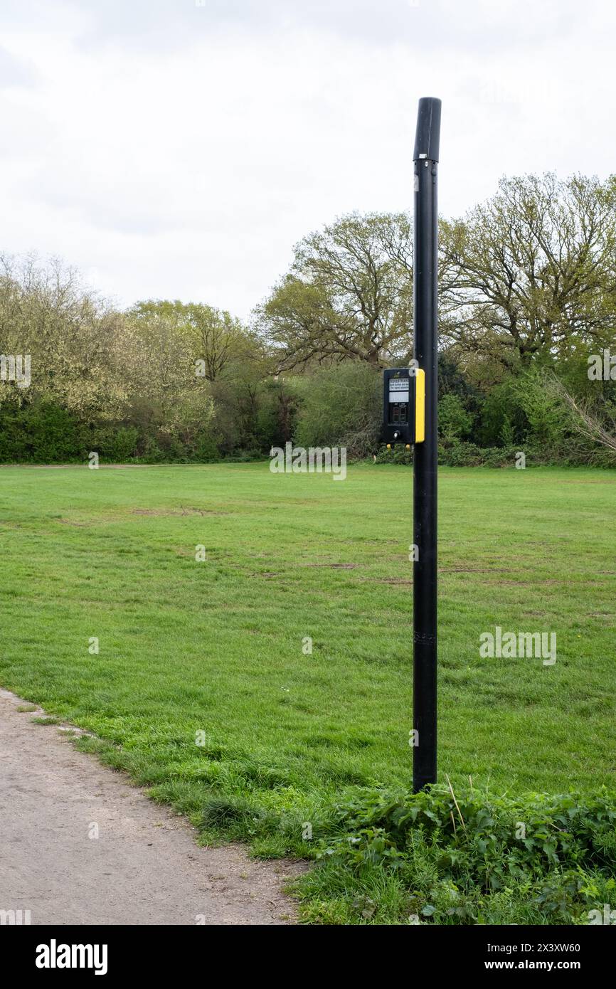 Photograph of a black pole with an equestrian crossing box halfway up ...