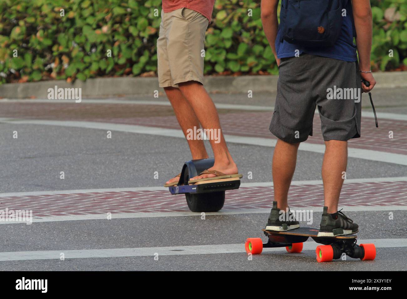 Young adult skateboard gliding hi-res stock photography and images - Alamy