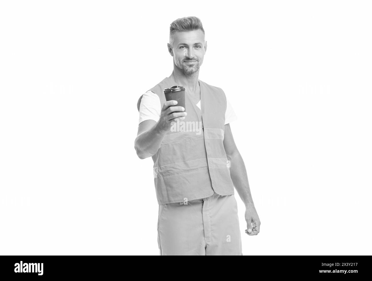 smiling man worker in white studio. man worker on background. photo of ...