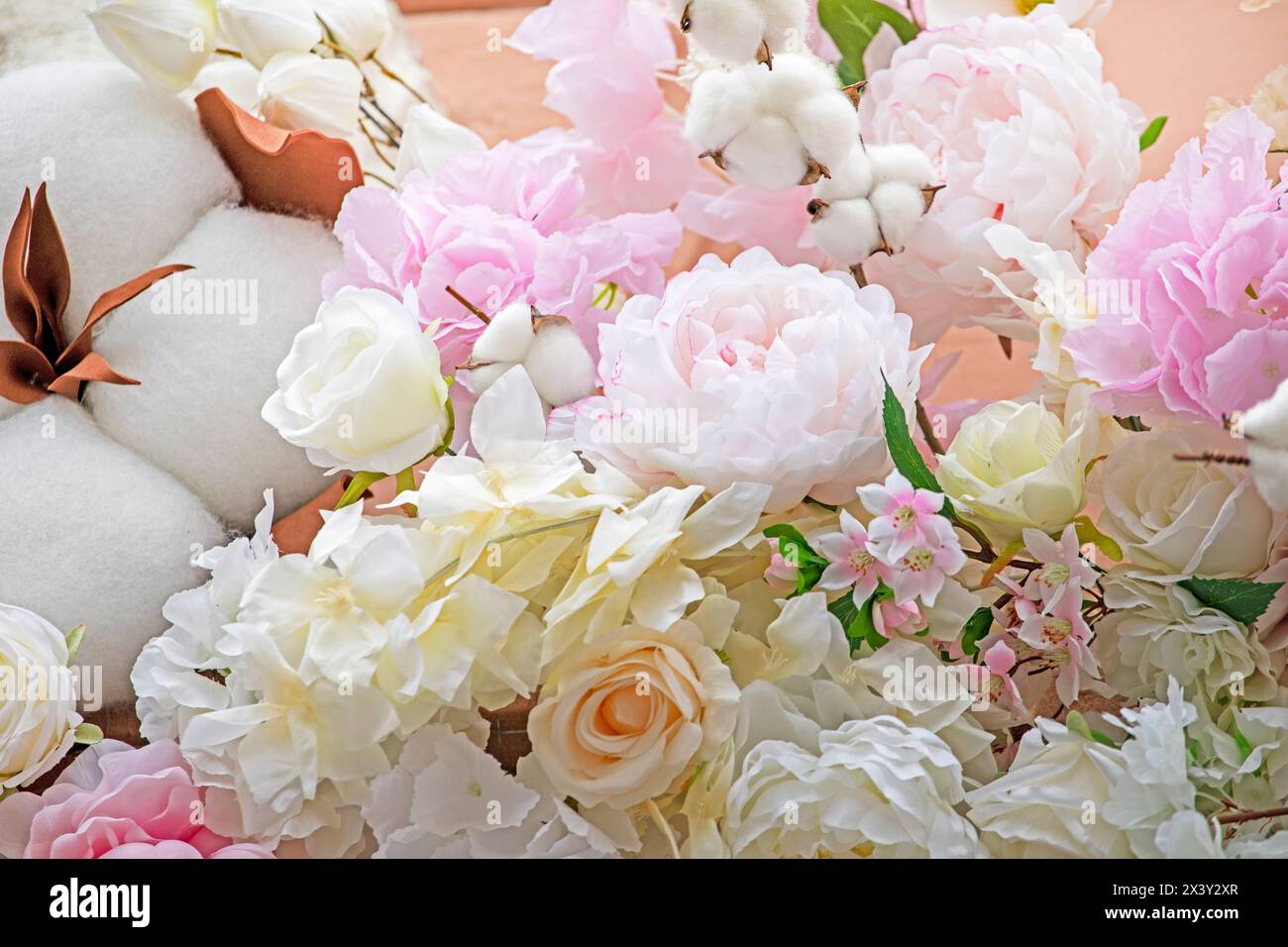 background made of soft pink artificial flowers and cotton. Wedding ...