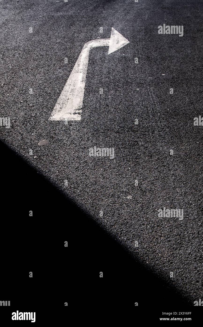 A turn right road marking In Newquay town centre in Cornwall in the UK ...