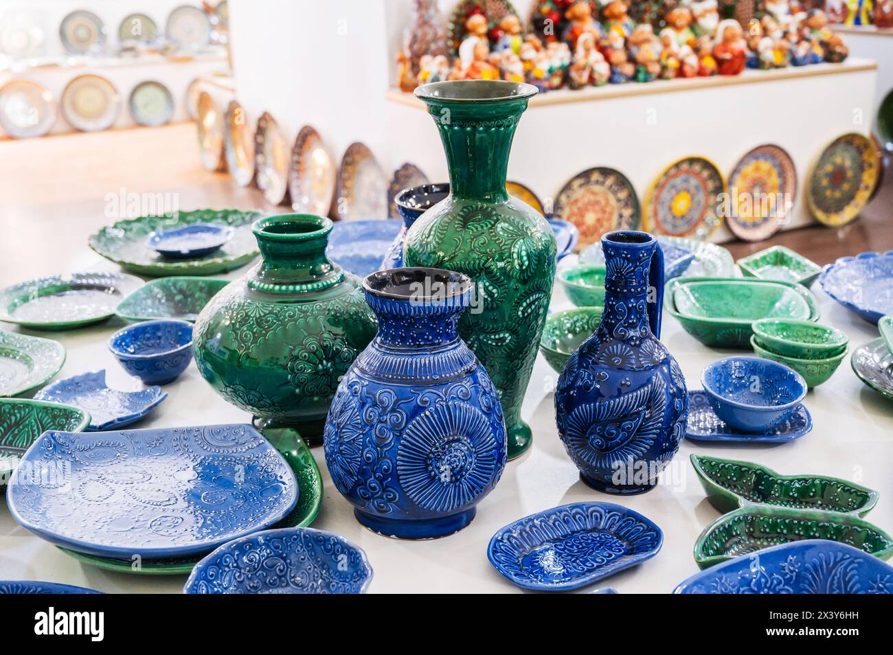 Uzbek handmade ceramic plates, vases and jug with hand-painted ...