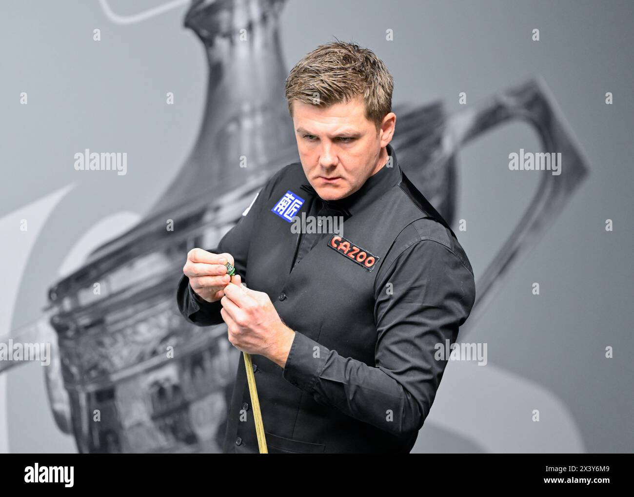 Ryan Day chalks his cue, during the Cazoo World Championships 2024 at ...