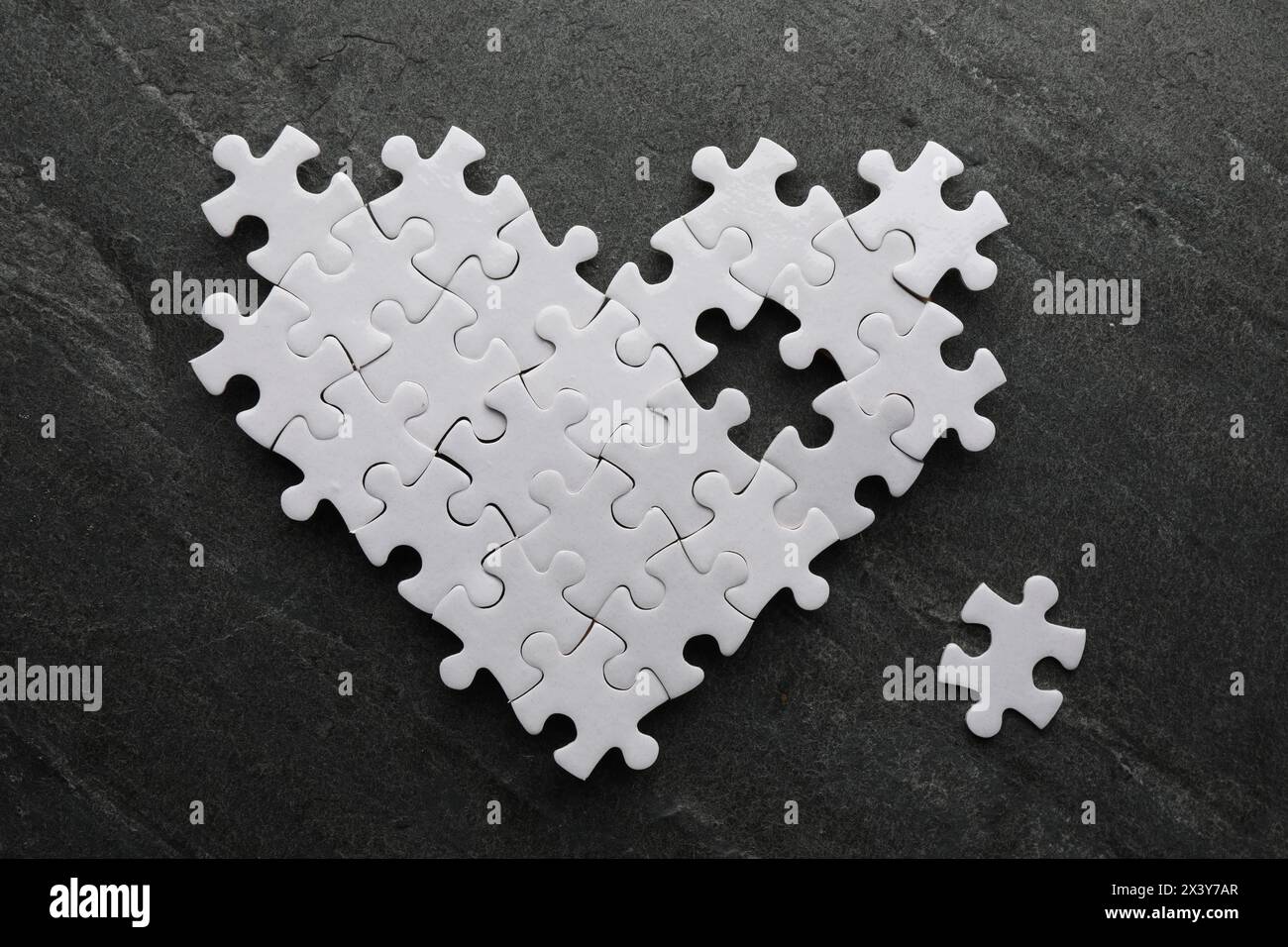 Heart made of puzzles hi-res stock photography and images - Alamy