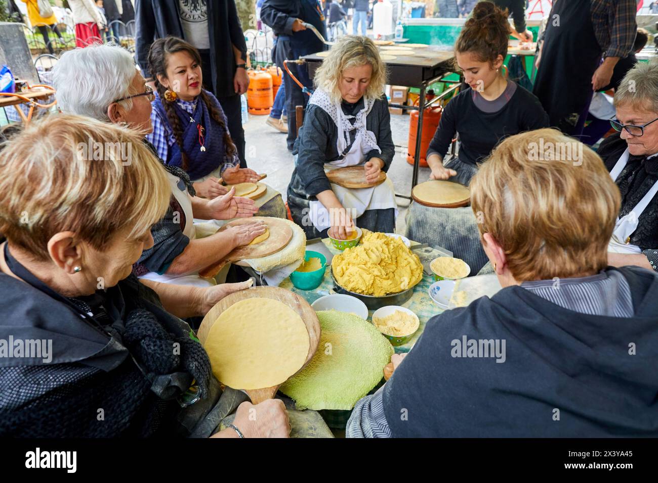 Elaboration of Talos (Cakes with corn flour), People dressed in typical ...