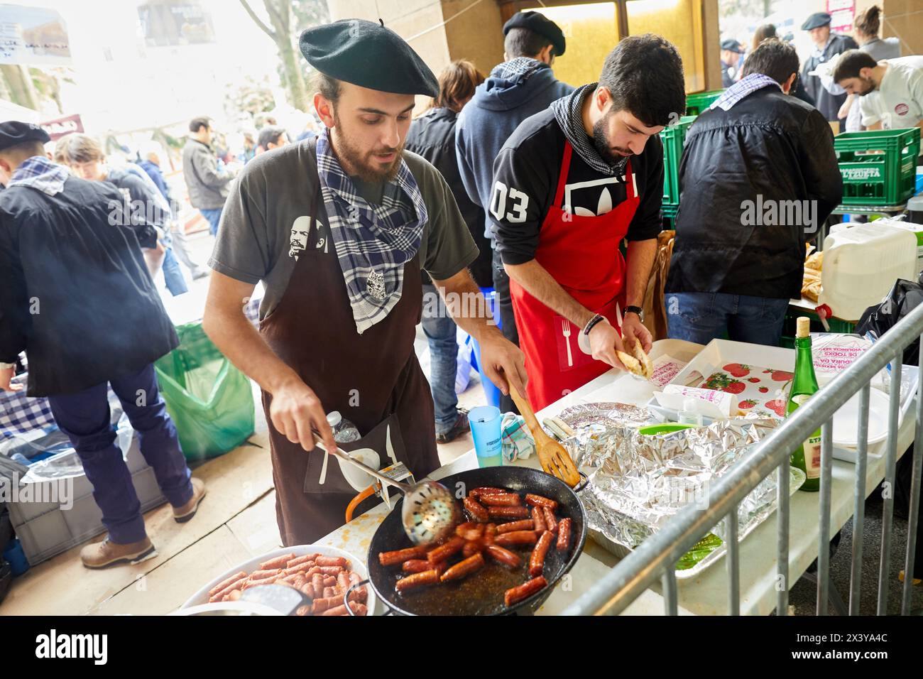 Frying txistorra (chorizo), People dressed in typical baserritarra ...
