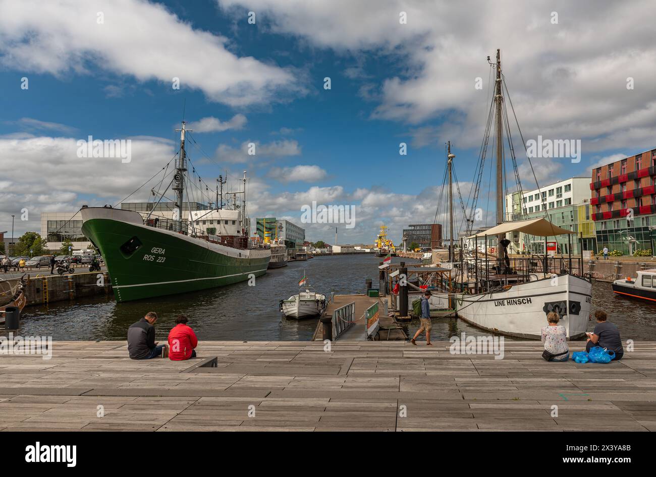 Tourists in the newly designed maritime district of Harbor worlds ...