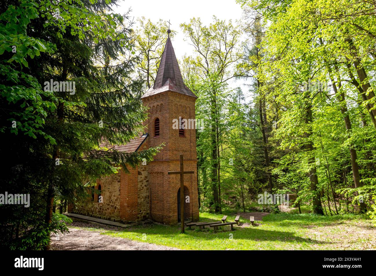 Old church with a wooden cross in the forest near Sobeslav. South ...