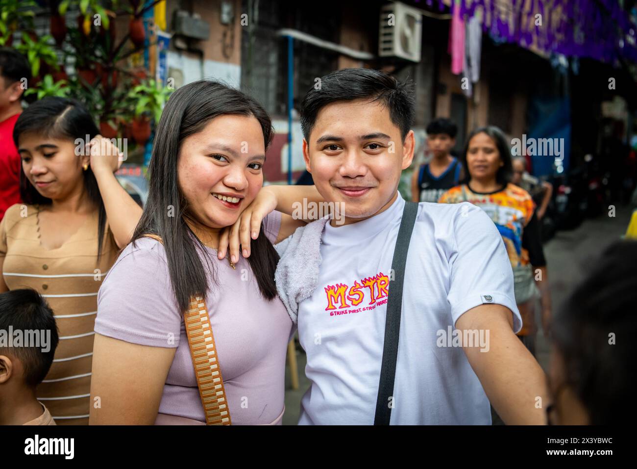 Filipino children play street games together during an annual religious ...