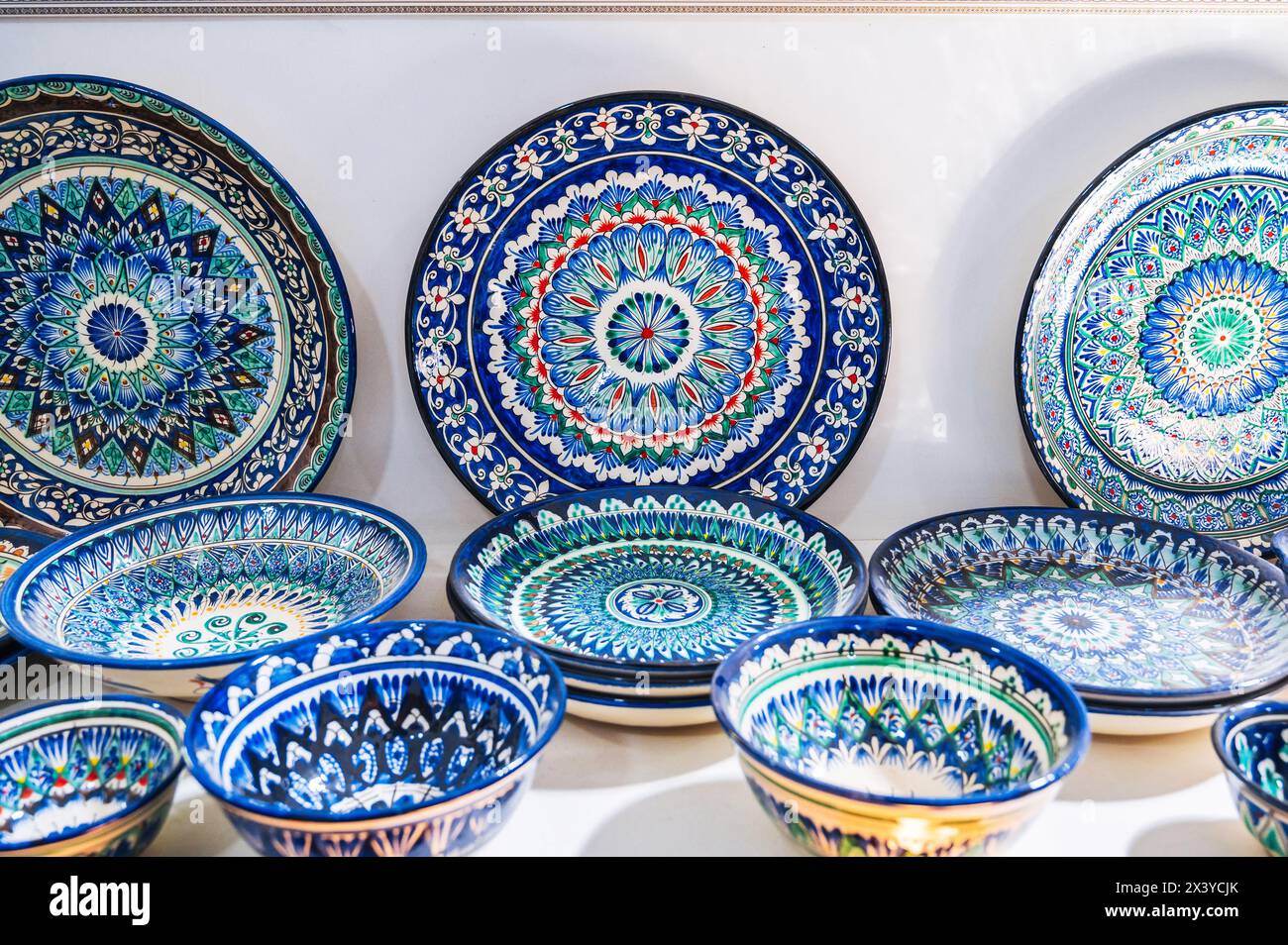 Uzbek handmade ceramic plates with hand-painted with a traditional East ...