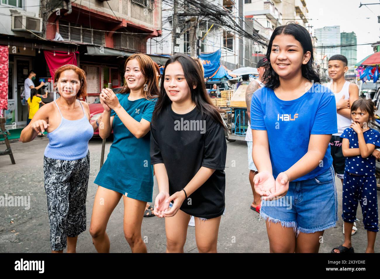 Filipino children play street games together during an annual religious ...