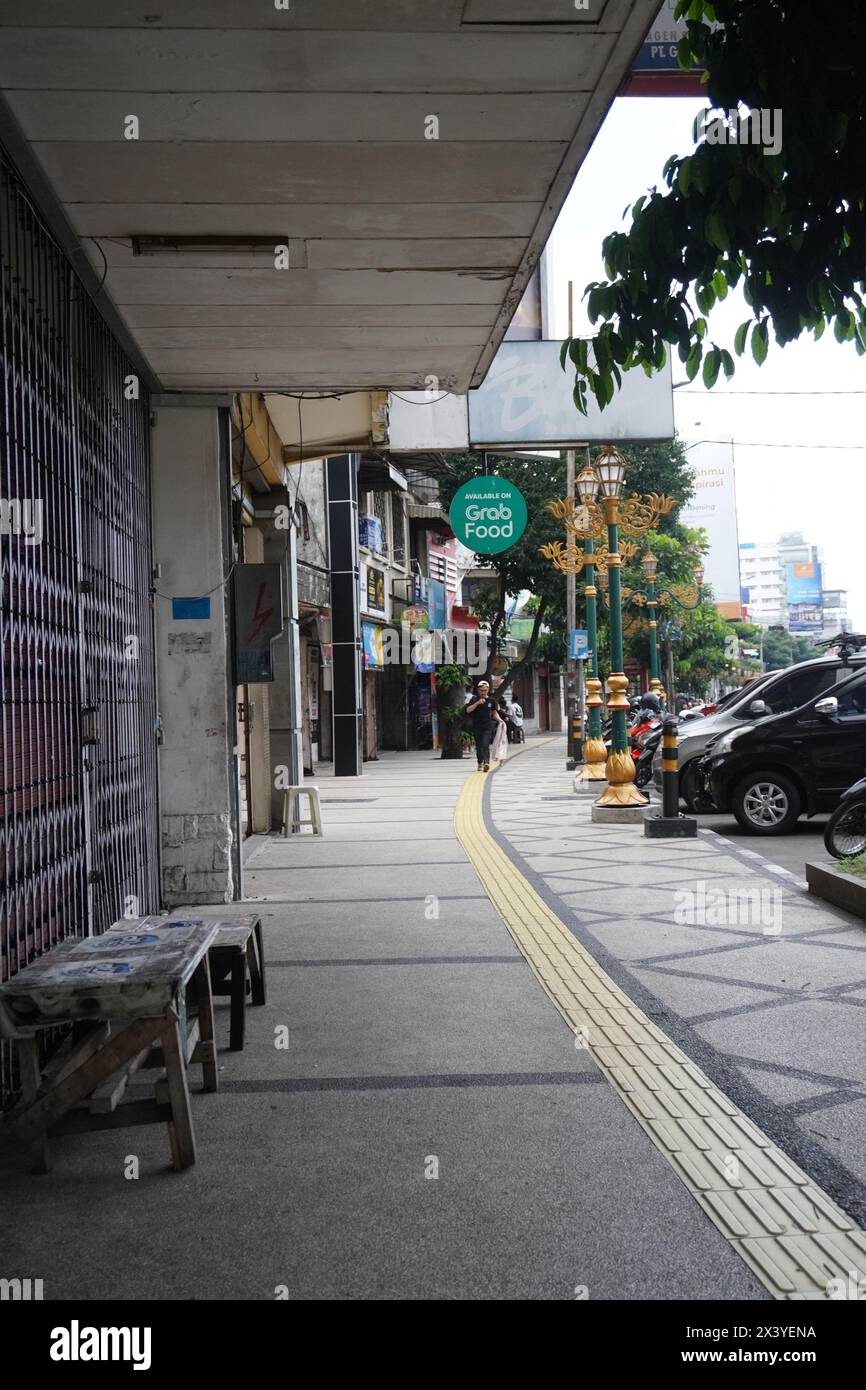 The atmosphere on the side of the road in the Kayutangan Heritage area ...